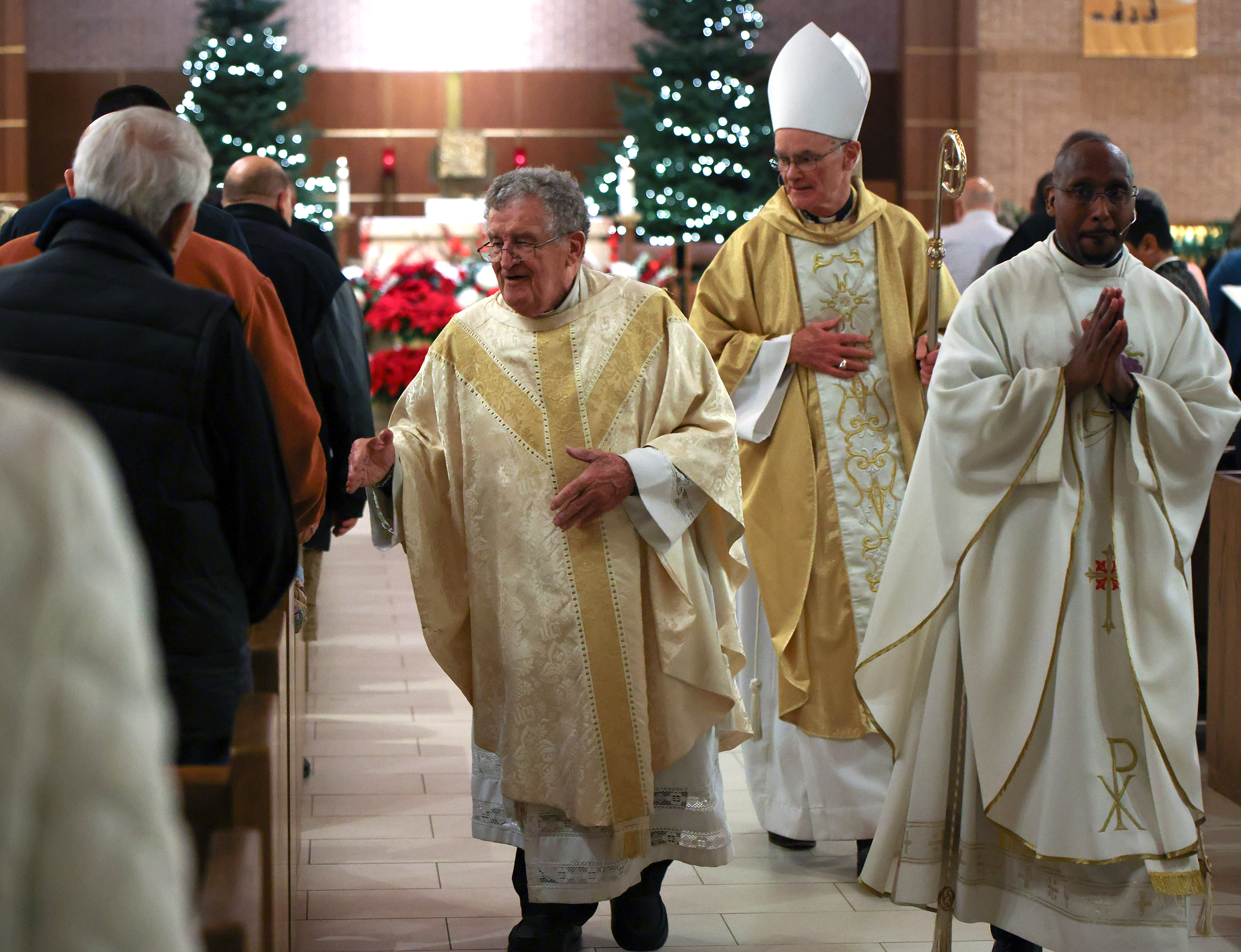Community wishes fond farewell to pastor emeritus – Texas Catholic